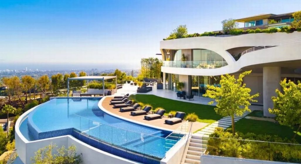 Travis Scott's New $34 Million Mansion With 20-Car Auto Gallery