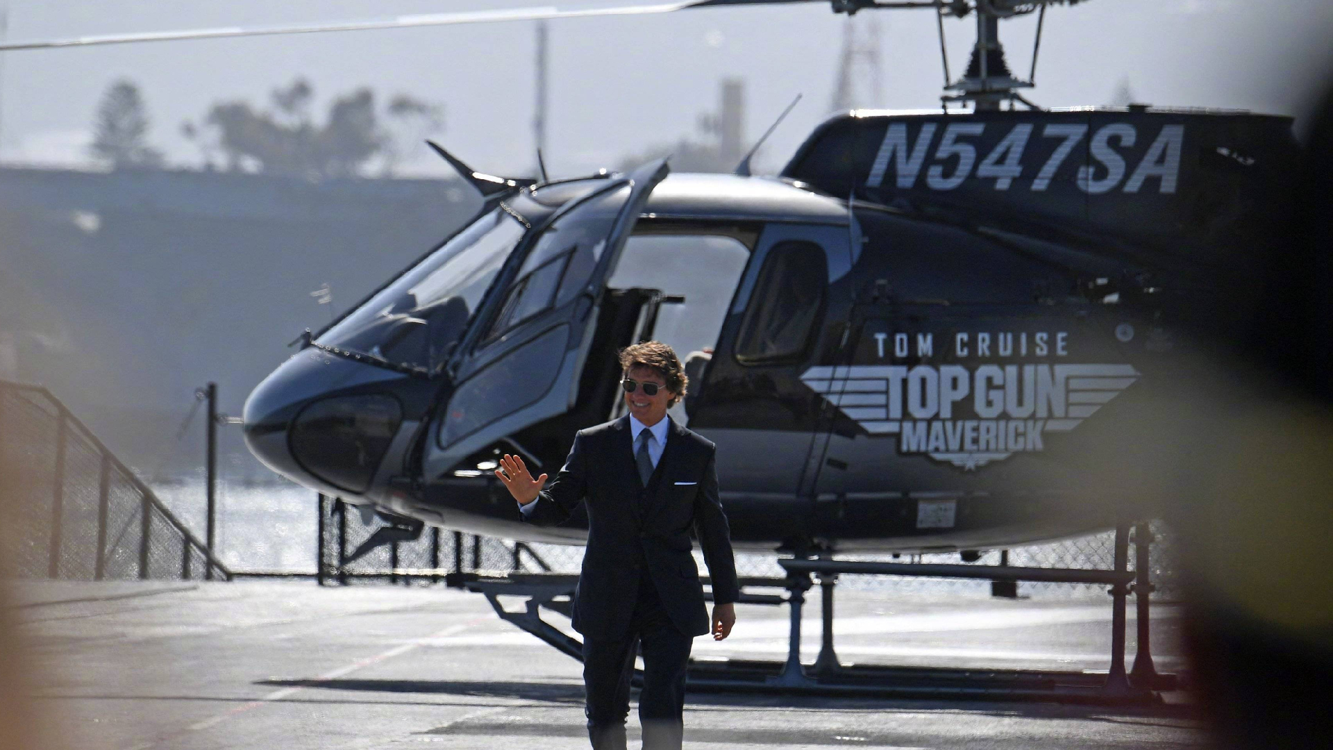 Tom Cruise Pilots Helicopter Onto Deck For Top Gun: Maverick Premiere